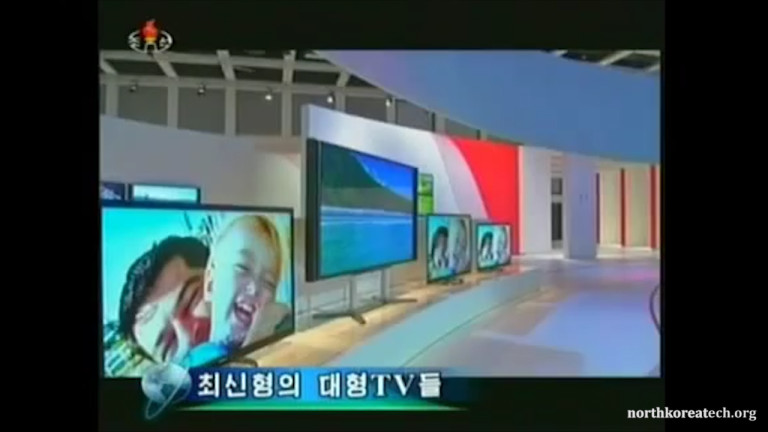 Japanese flat-screen TVs on evening news